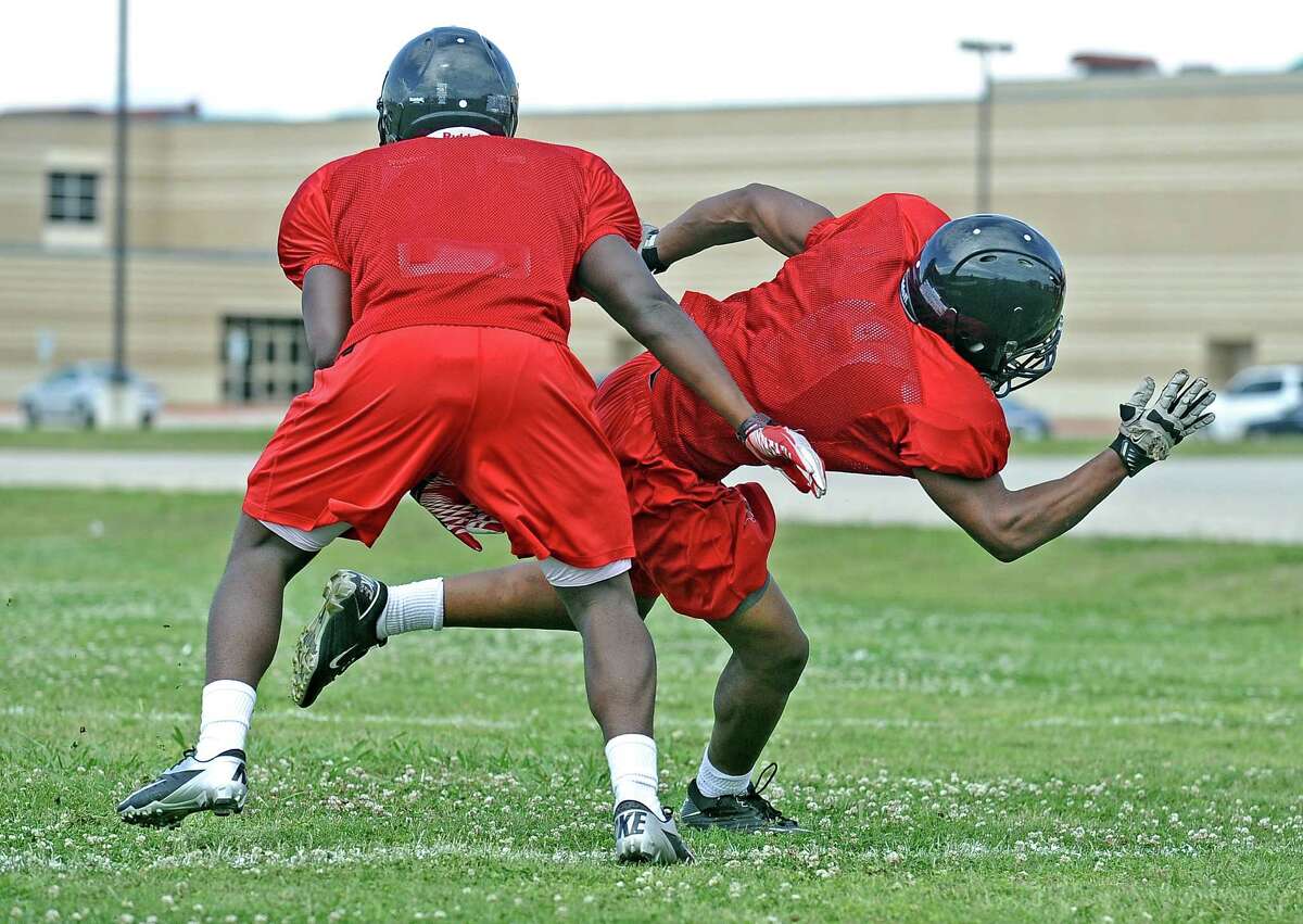 High school football spring practice begins