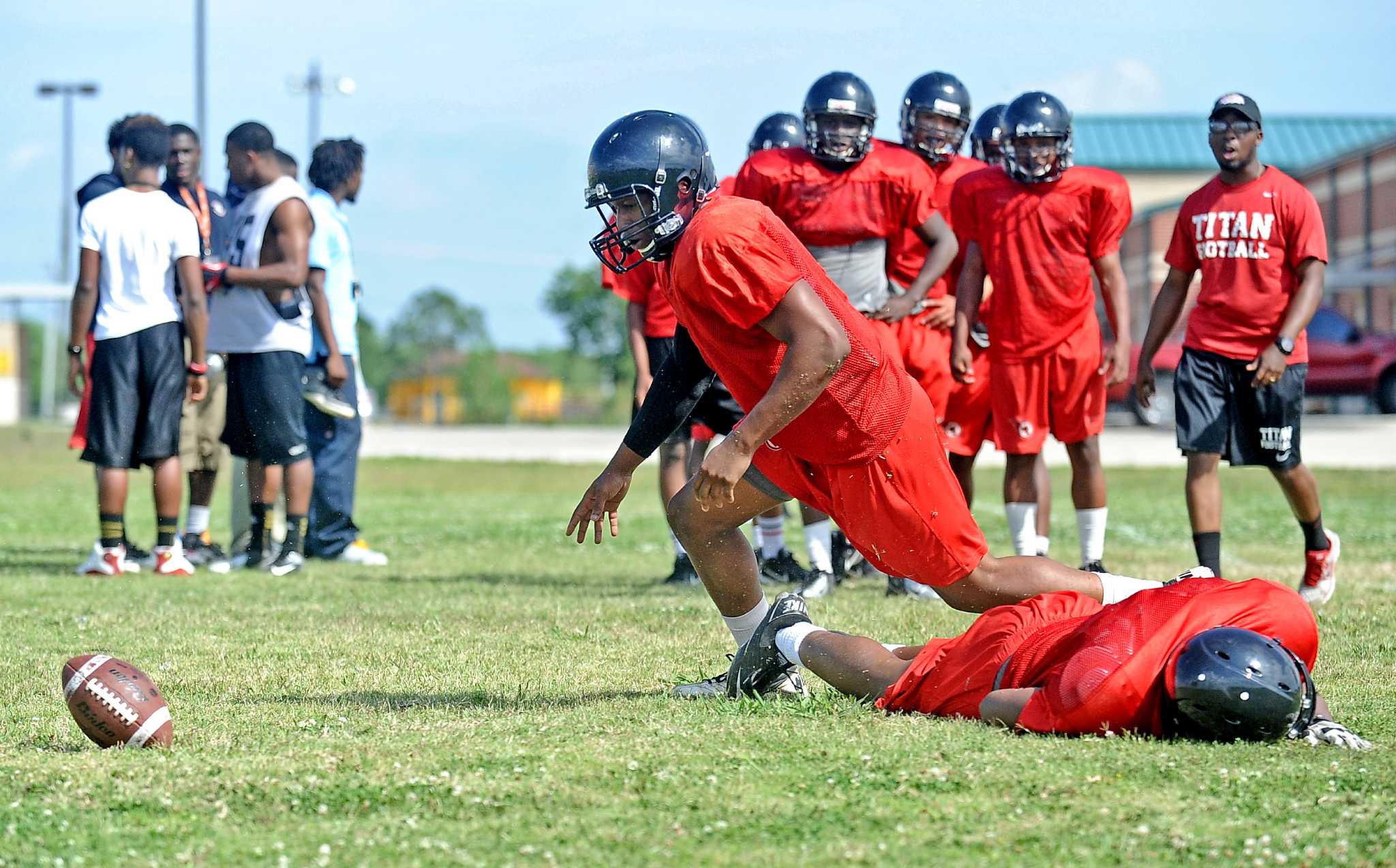 High school football spring practice begins