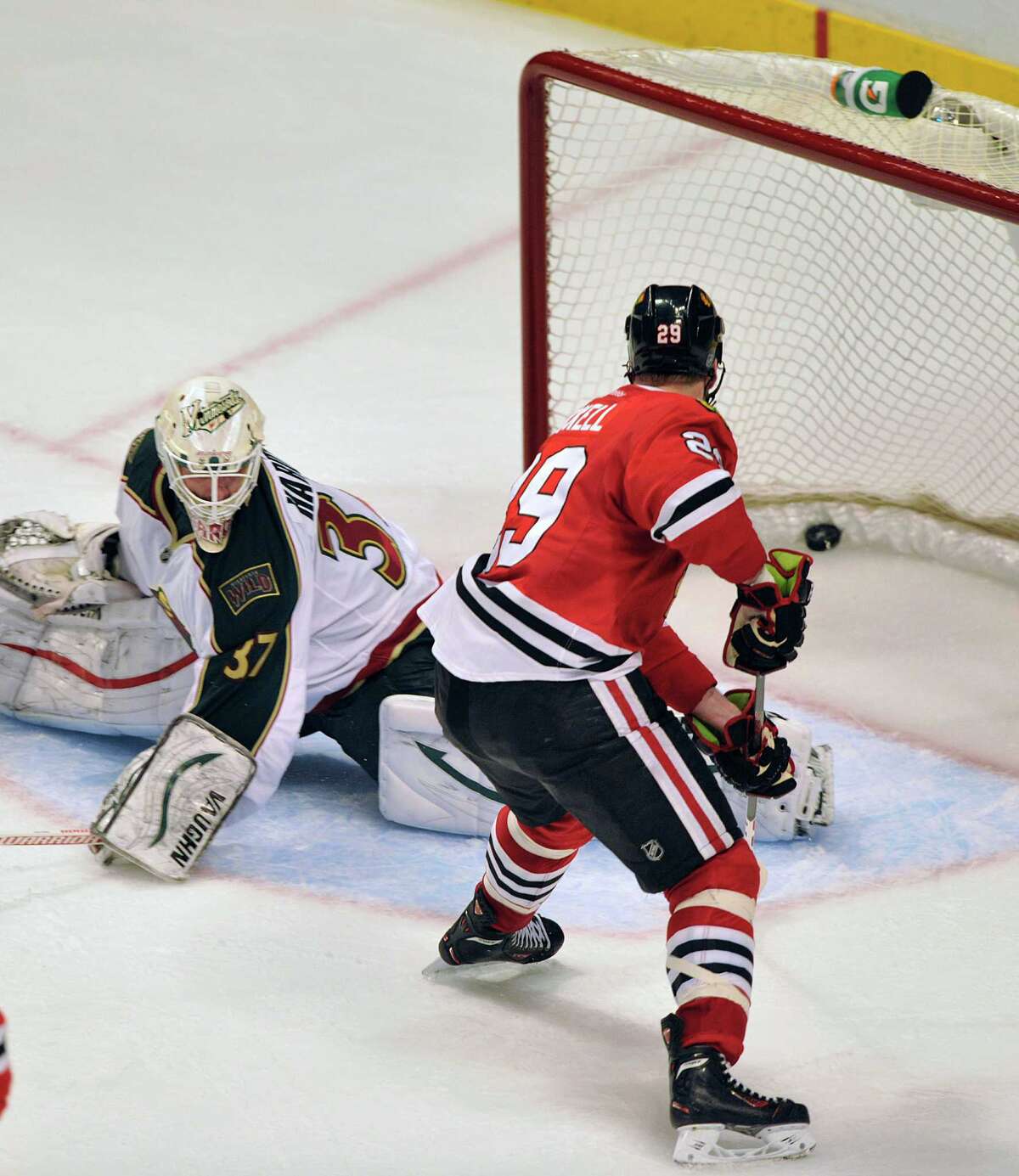Blackhawks, Blues open NHL playoffs with OT wins
