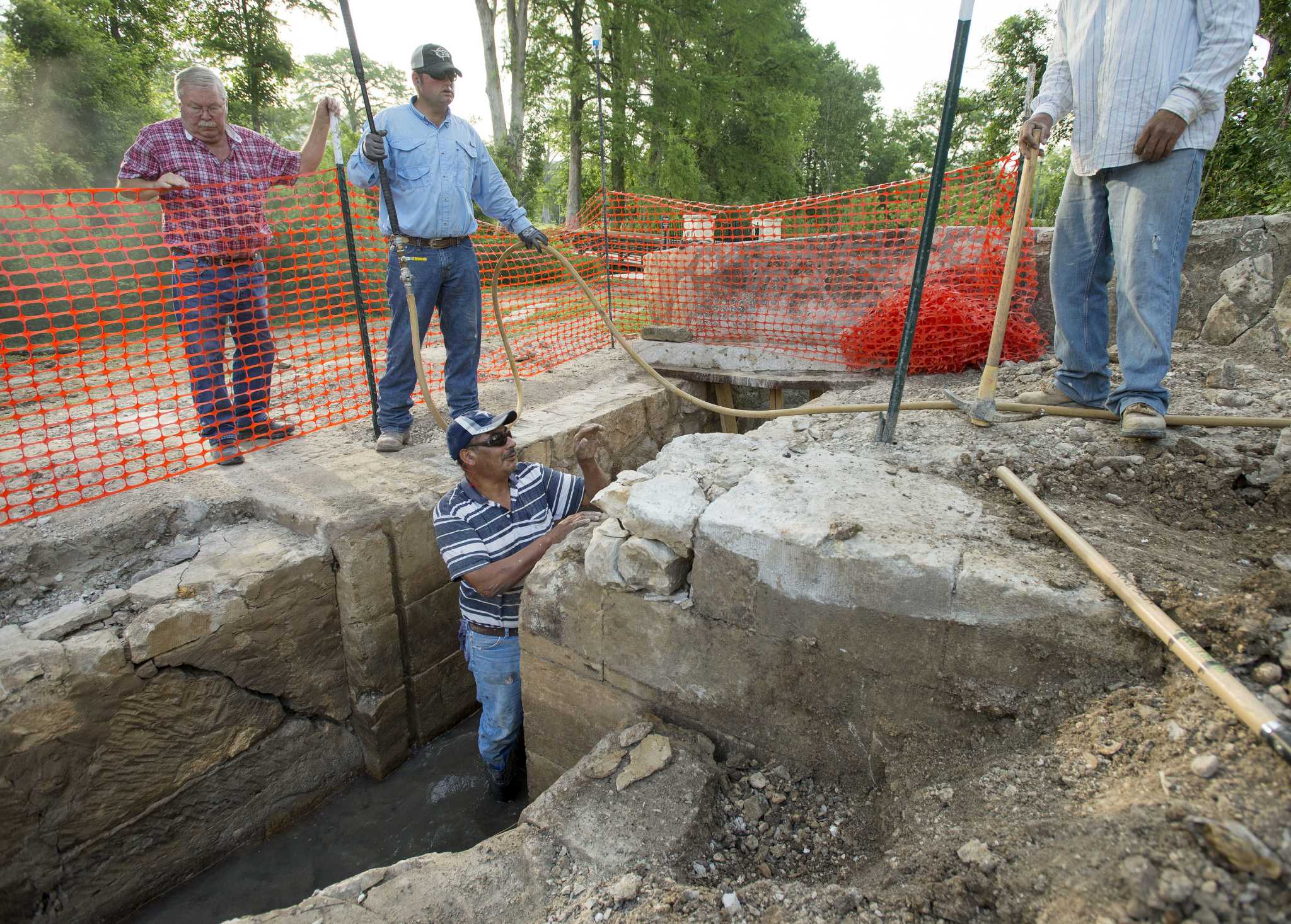 Long-buried parts of acequia unearthed