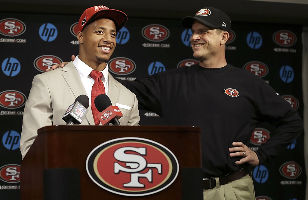 Harbaugh keeps busy during offseason