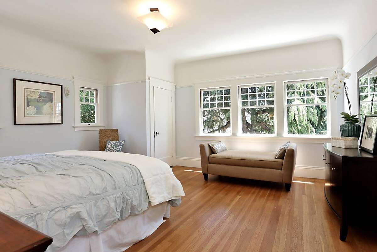 Oakland Dutch Colonial boasts fireplace