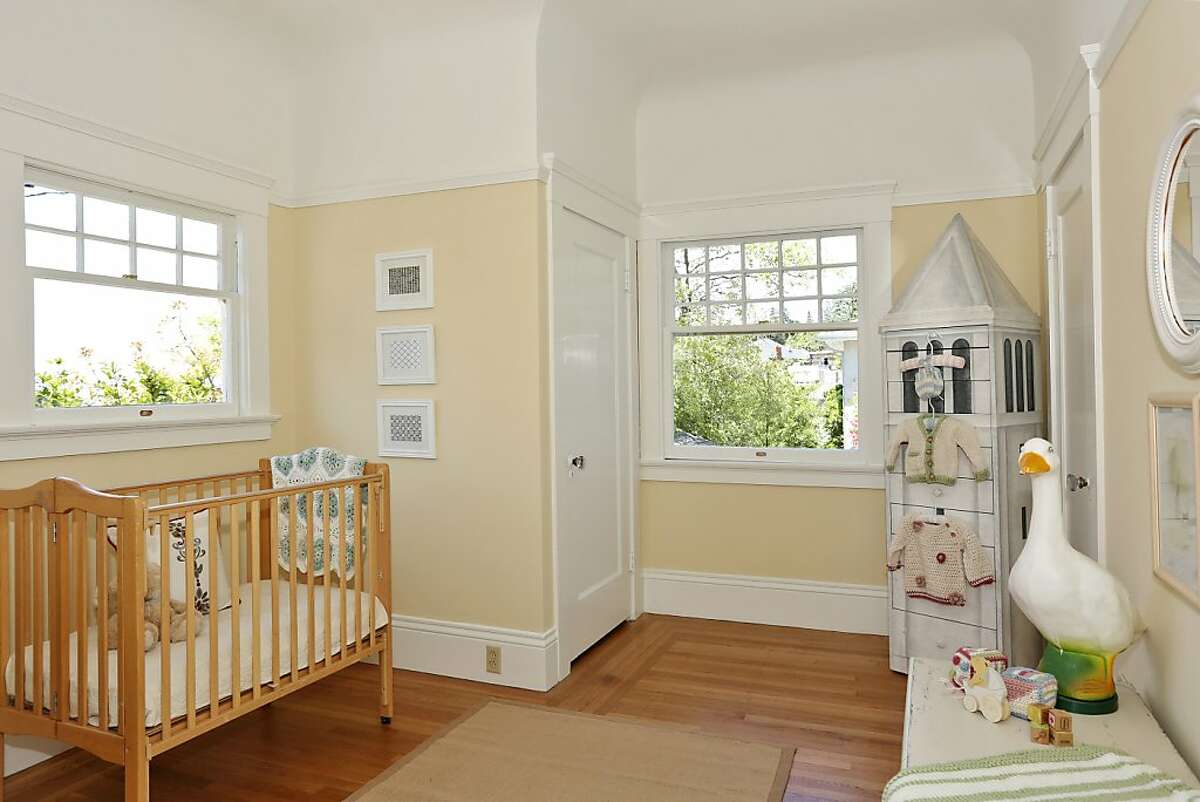 Oakland Dutch Colonial boasts fireplace