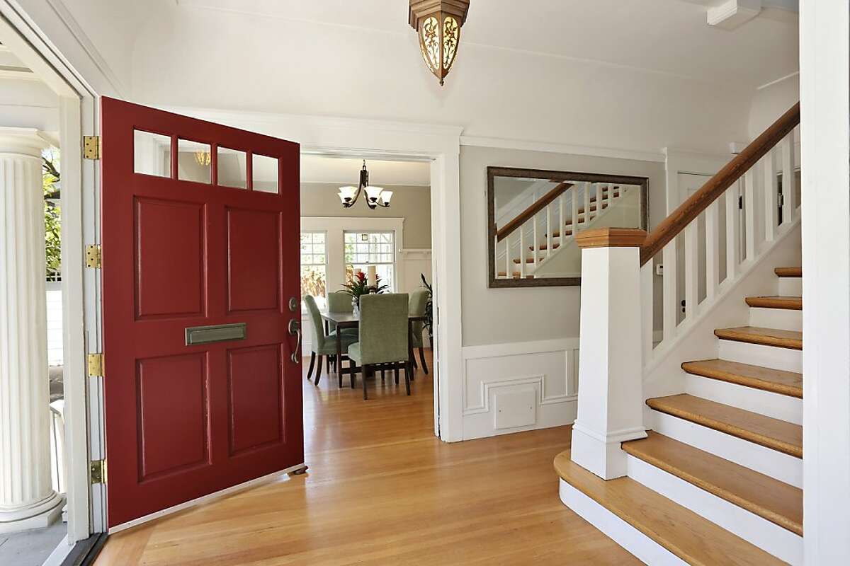 Oakland Dutch Colonial boasts fireplace