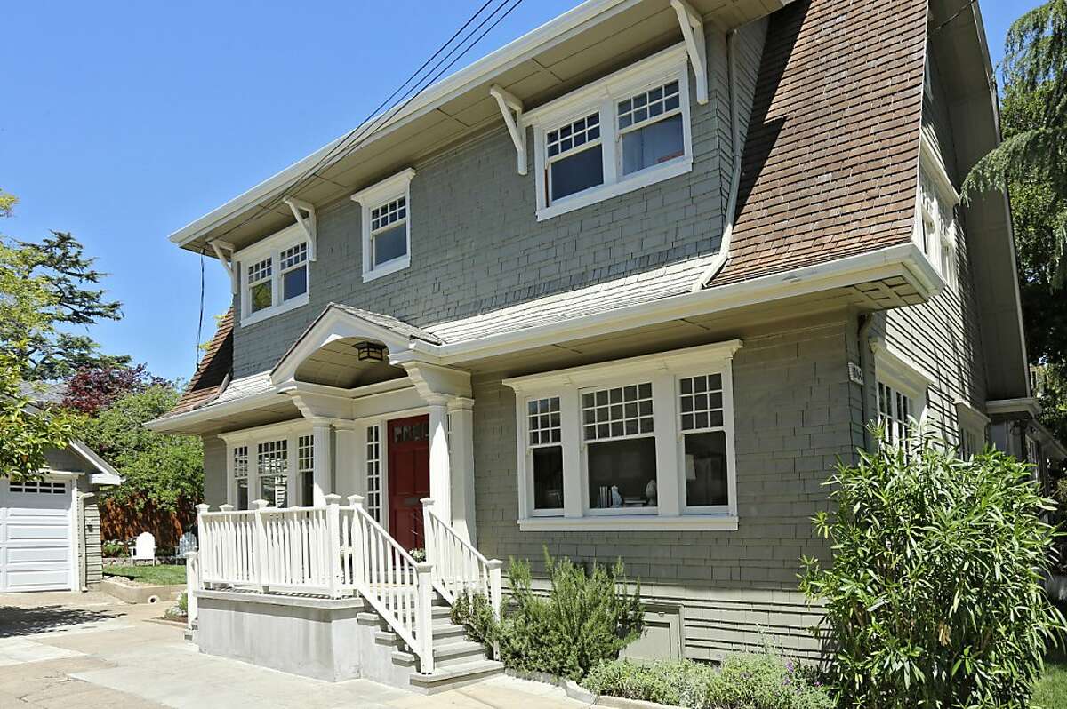 Oakland Dutch Colonial boasts fireplace