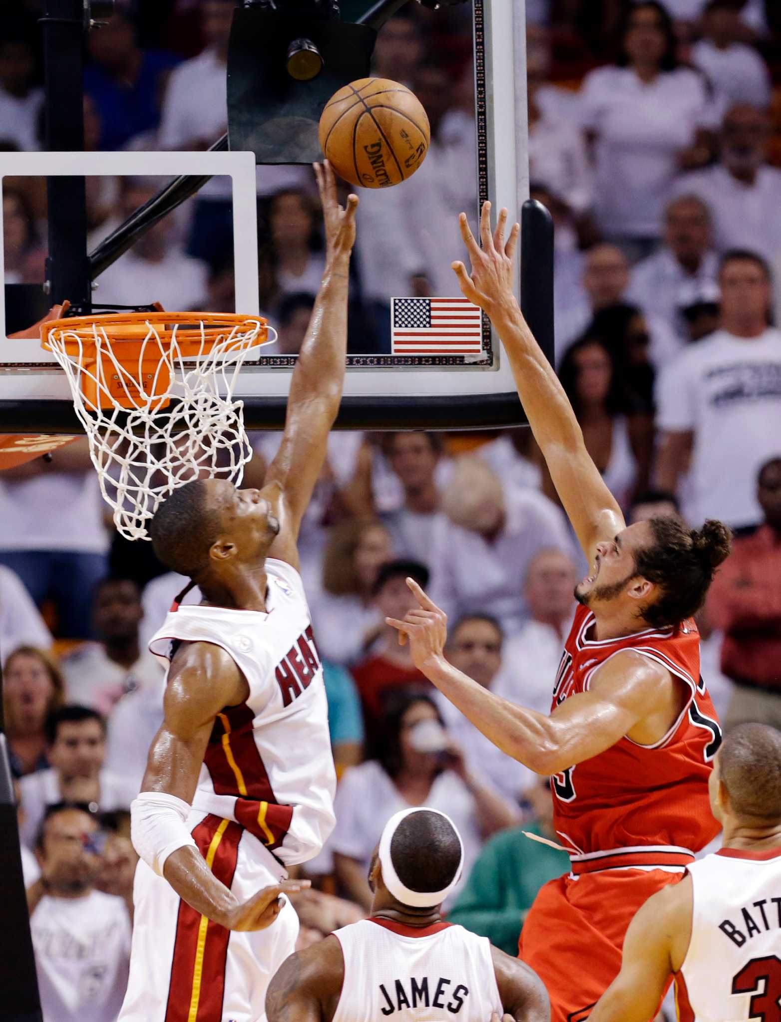 Heat throttle Bulls to even series
