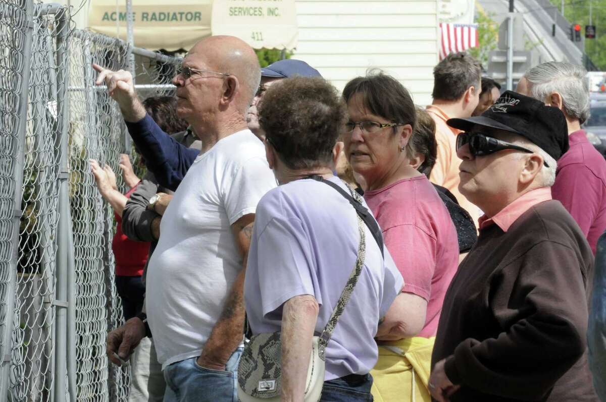 Crowd cheers as stubborn church steeple resists demolition