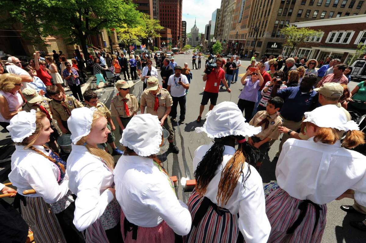Photos: Scrubbing the street for Tulip Fest