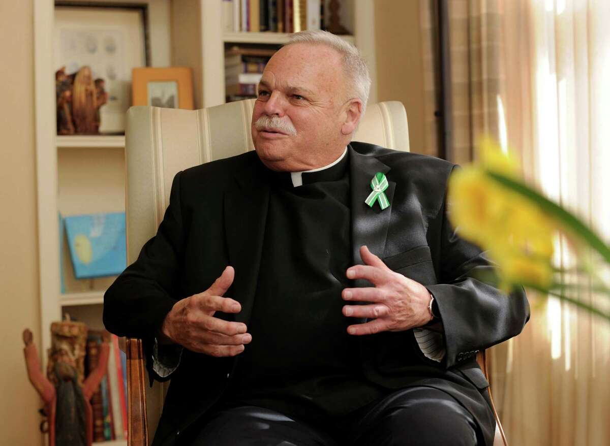 In Newtown, the pastor of his flock struggles on