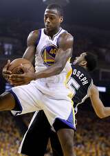 Warriors beat Spurs in OT, even series