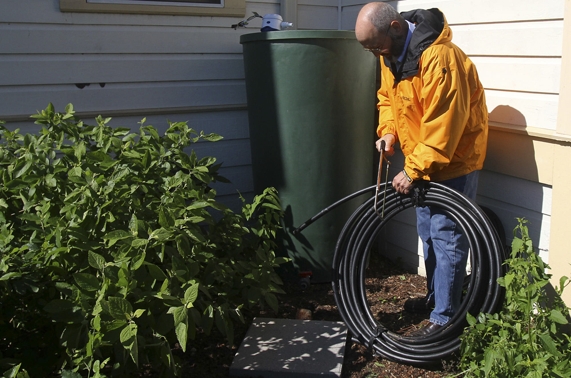 Washing clothes to water yards