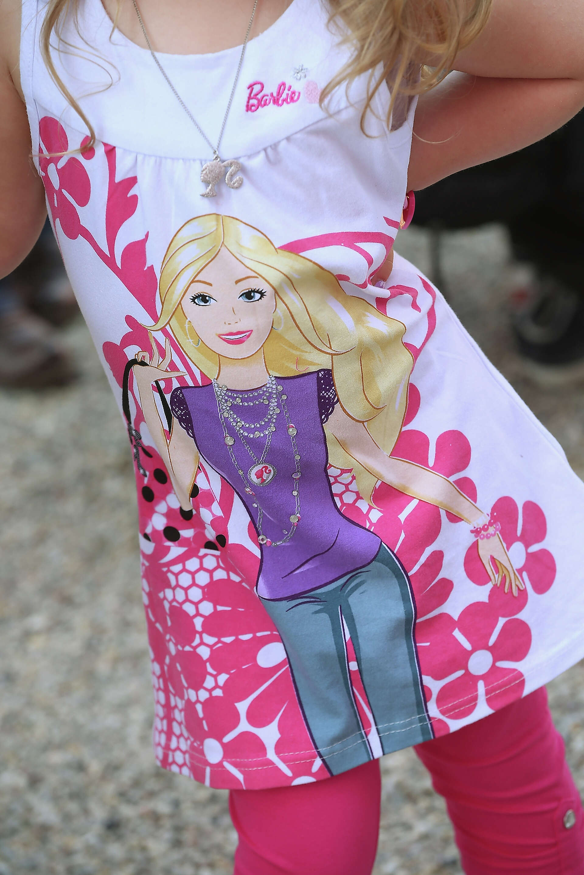 Activists protest life-size Barbie's 'Dreamhouse'