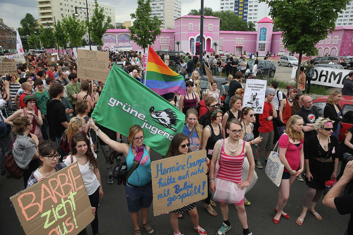 Activists protest life-size Barbie's 'Dreamhouse'