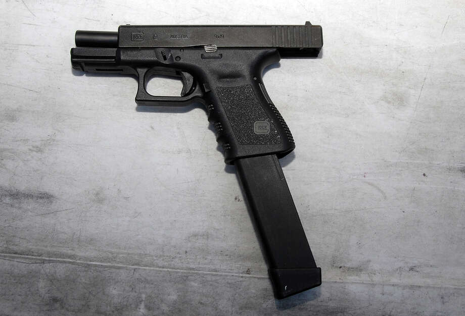 Police: Gangster says he was just testing Glock outside rap show ...