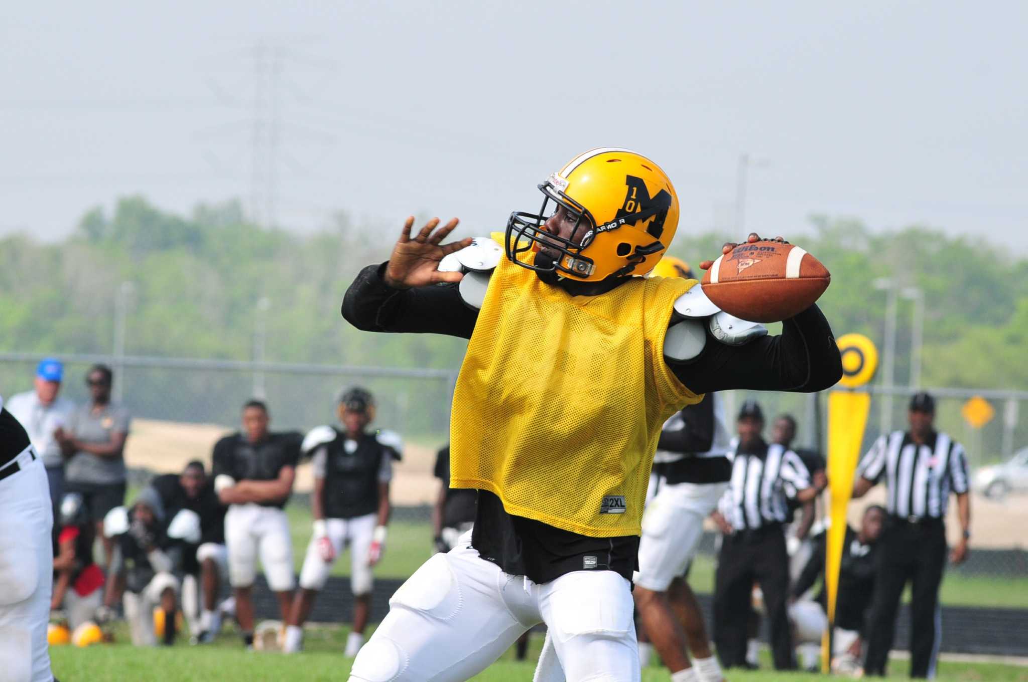 Marshall football team loaded for run at the top