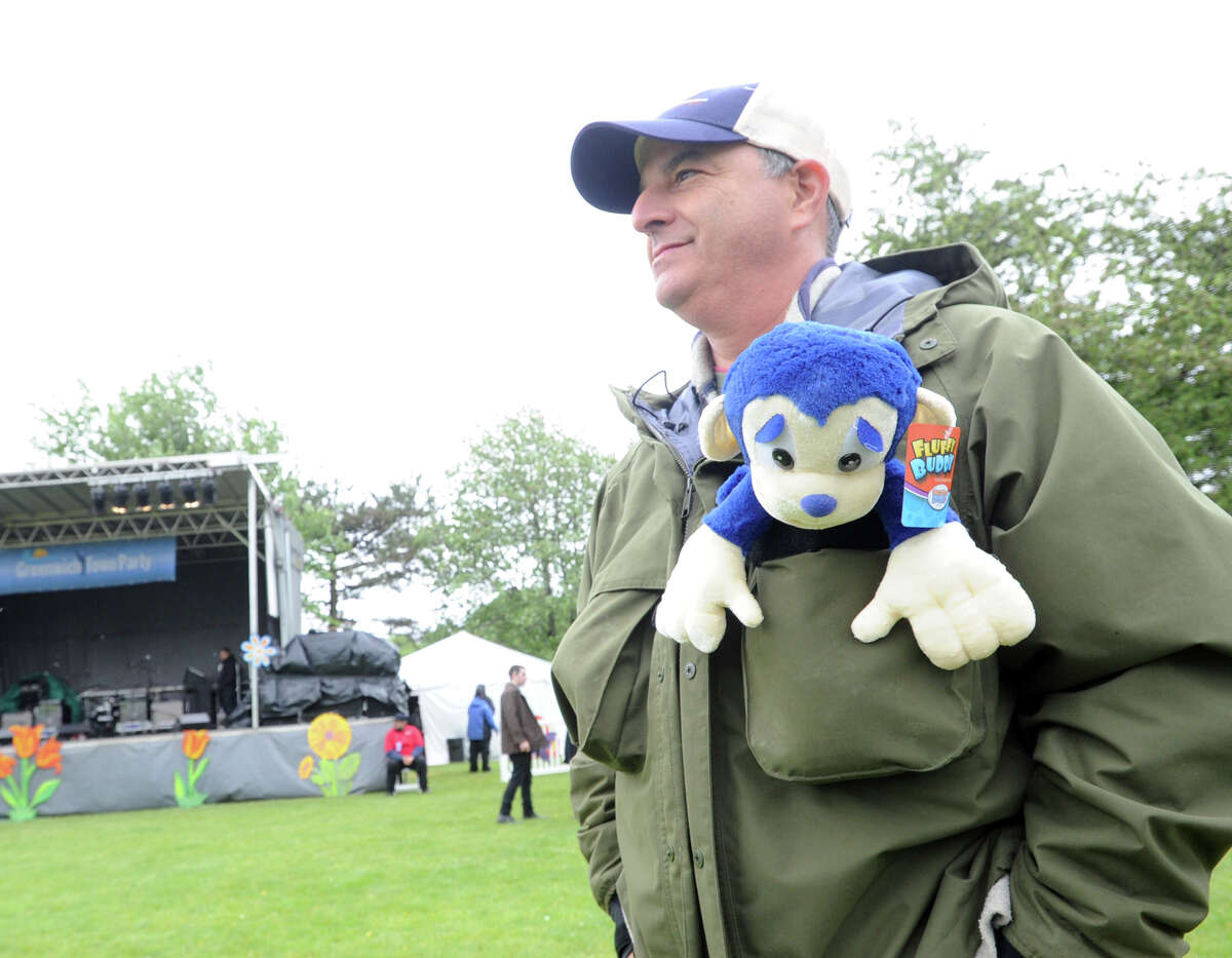 Greenwich Town Party attendees brave the elements