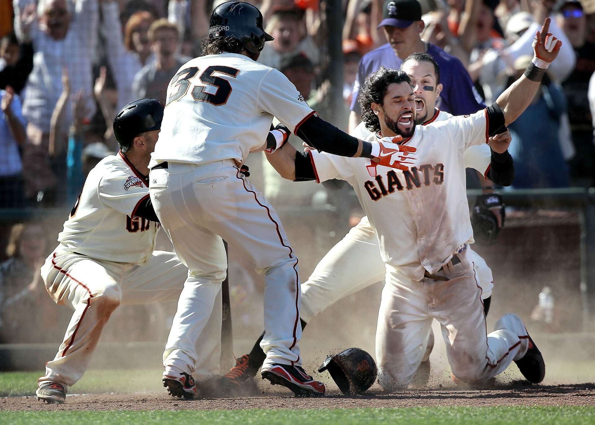 Pagan's inside-the-parker beats Rockies