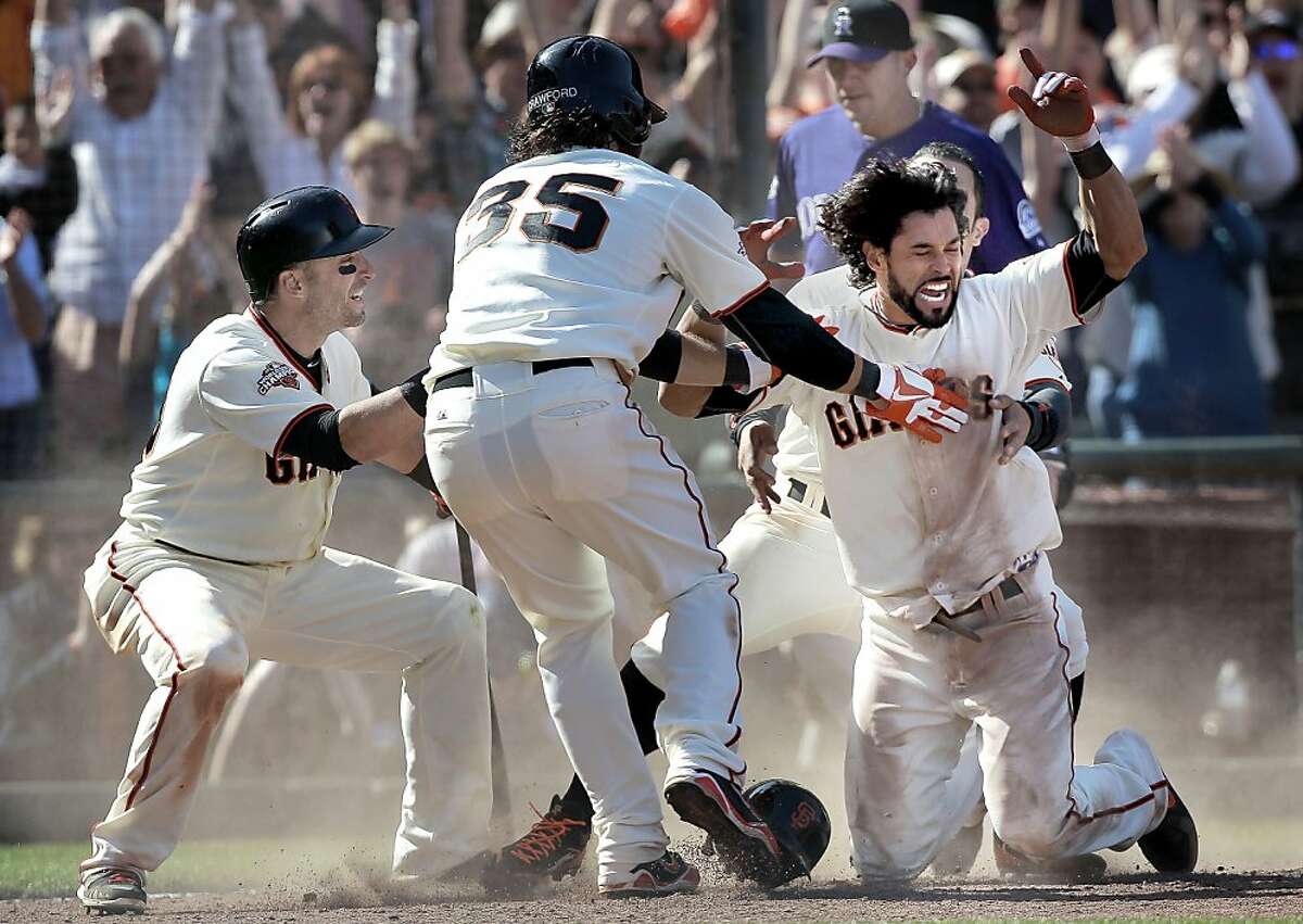 Pagan's inside-the-parker beats Rockies