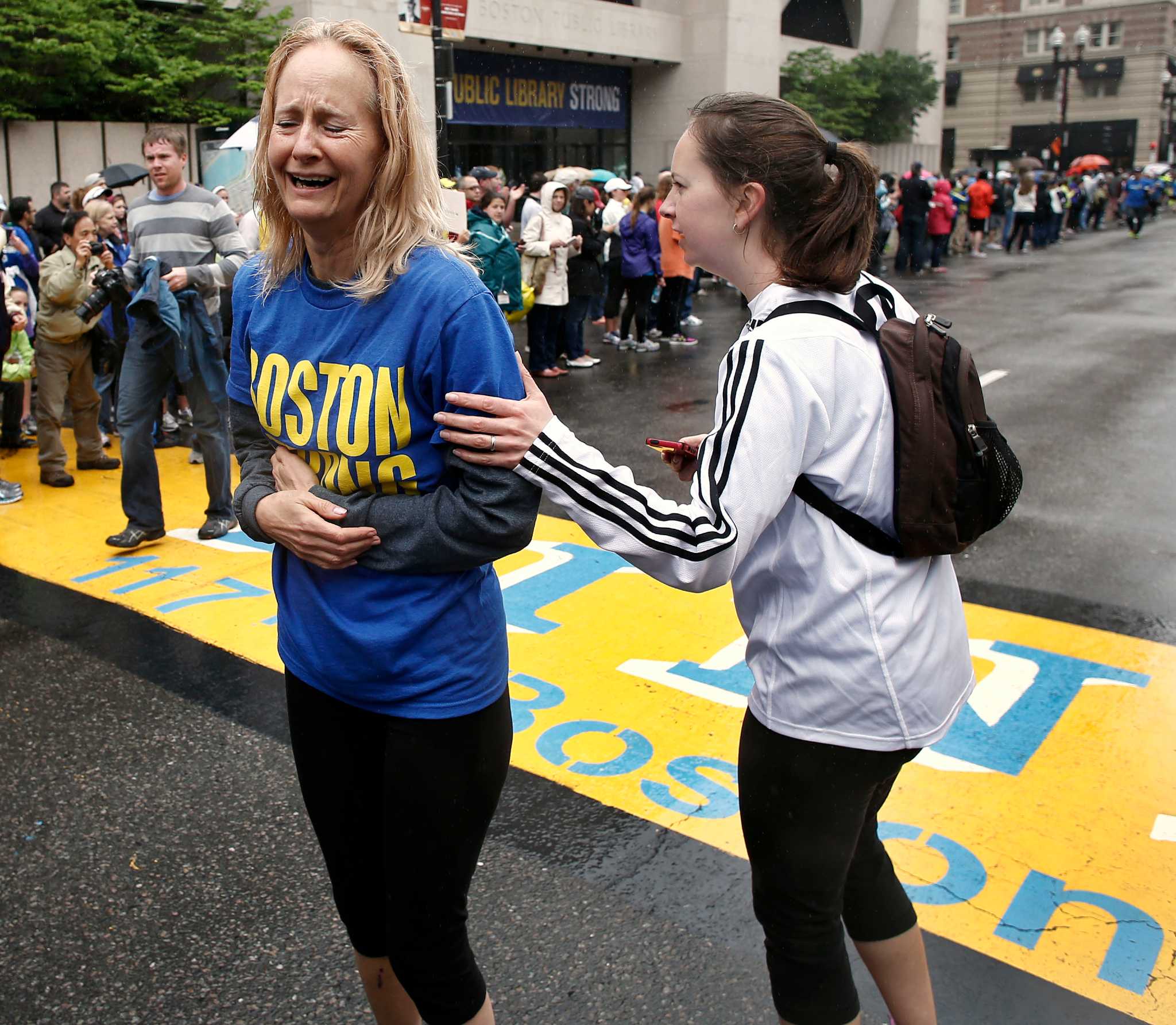 Thousands walk, run final mile of Boston Marathon