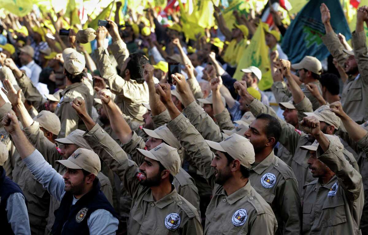 Hezbollah group vows to back Assad