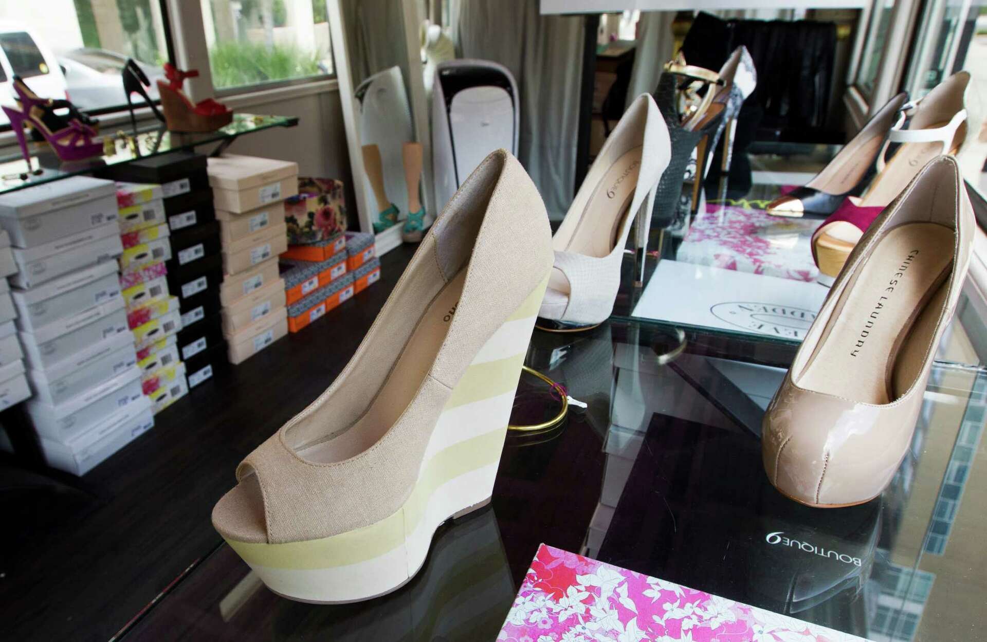 Footwear retailer has on her travelin' shoes