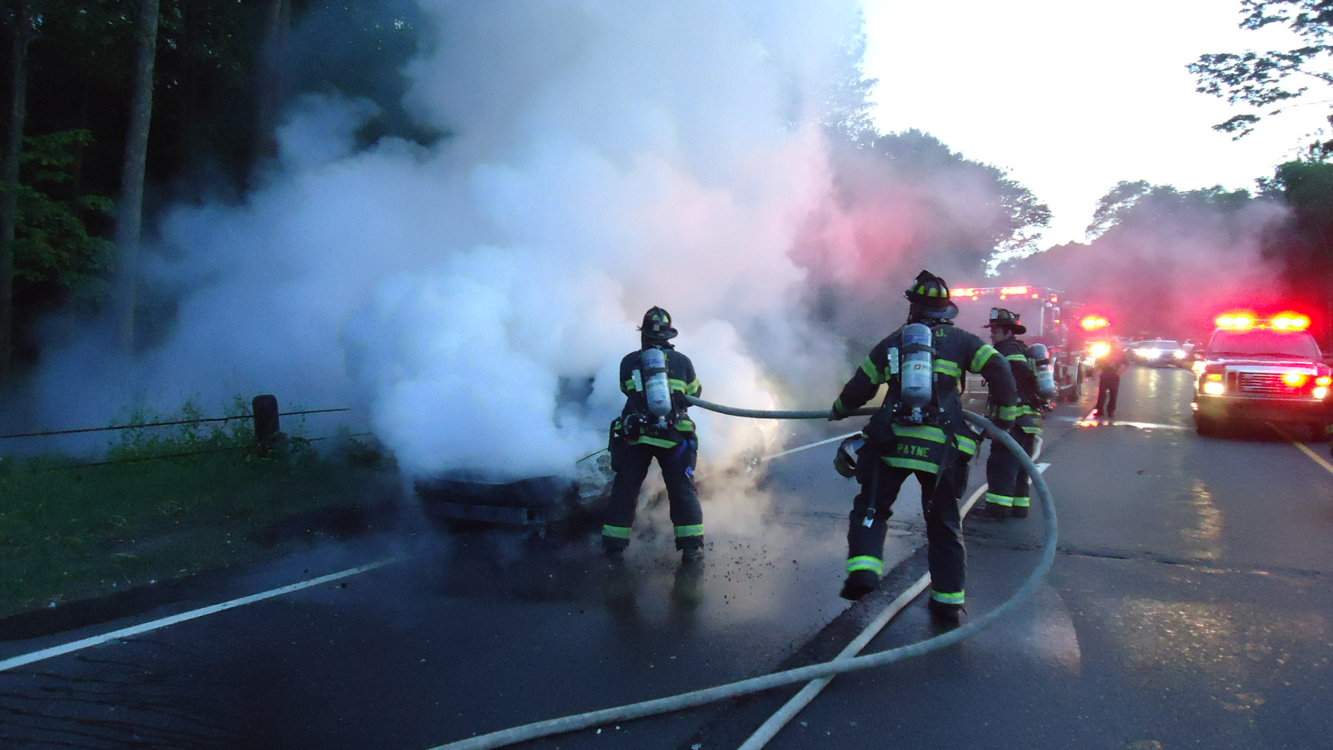 Car fire closes two parkway lanes