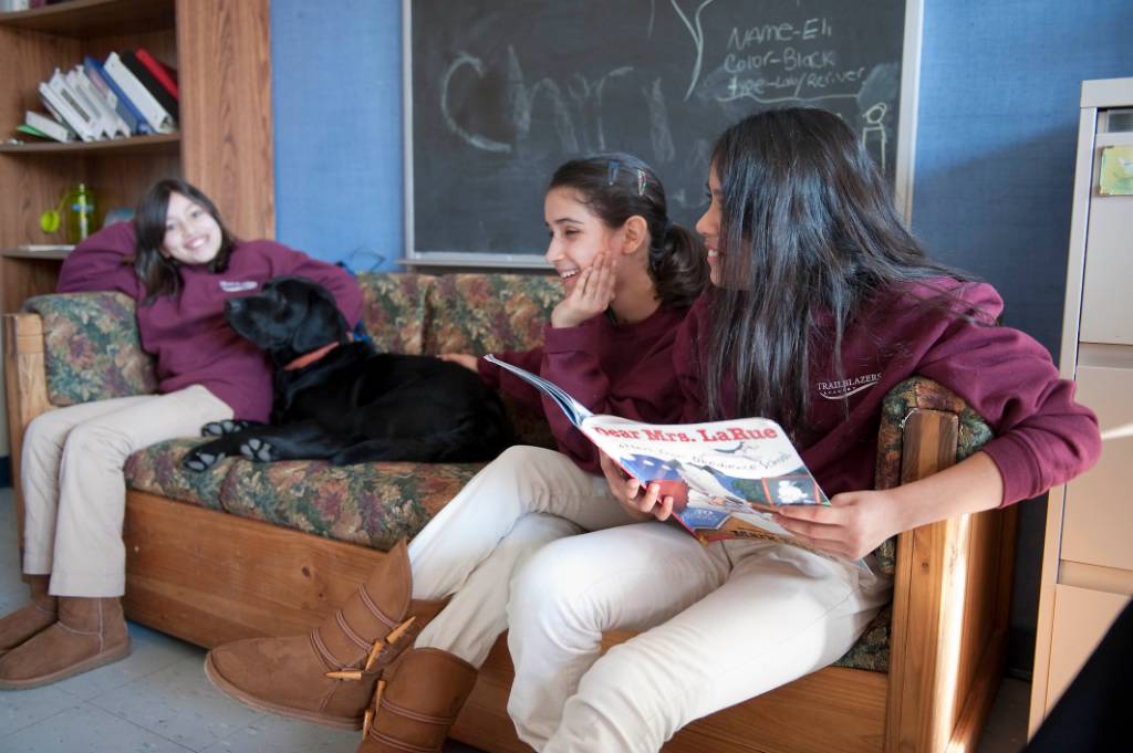 Dogs help kids learn to read tales