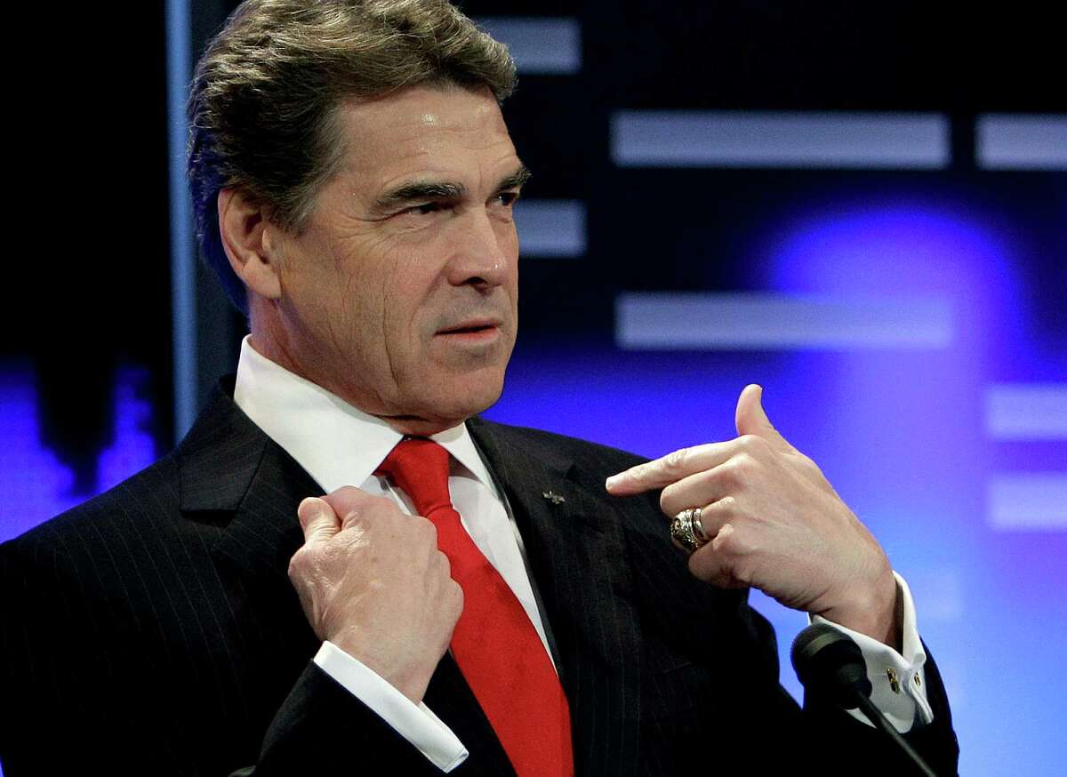 Rick Perry sports new specs and shades of gray