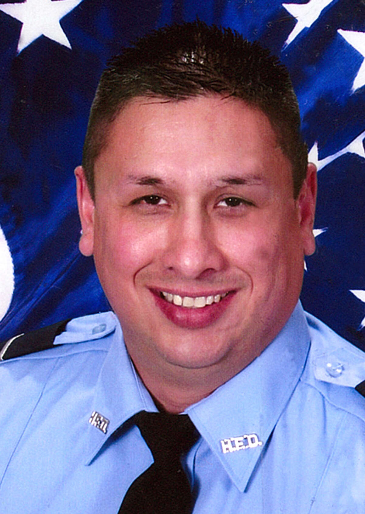 In shell of burned building, investigators look for source of deadly fire