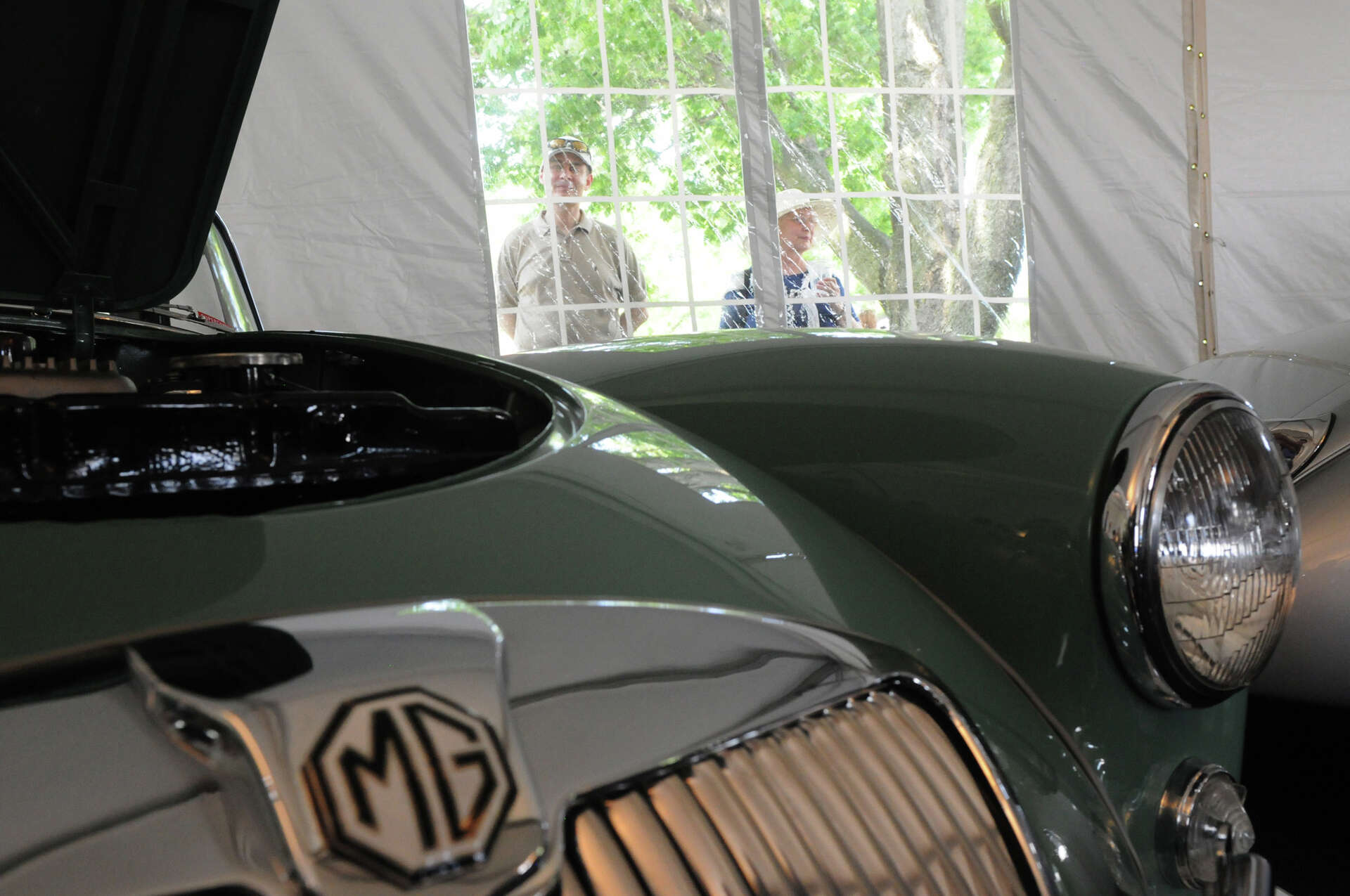 Auto auction, show hits with car crowd