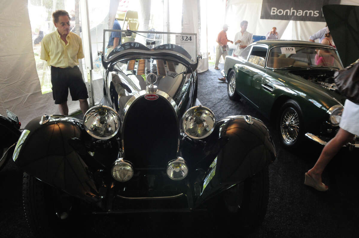 Auto auction, show hits with car crowd