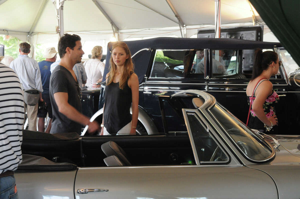 Auto auction, show hits with car crowd