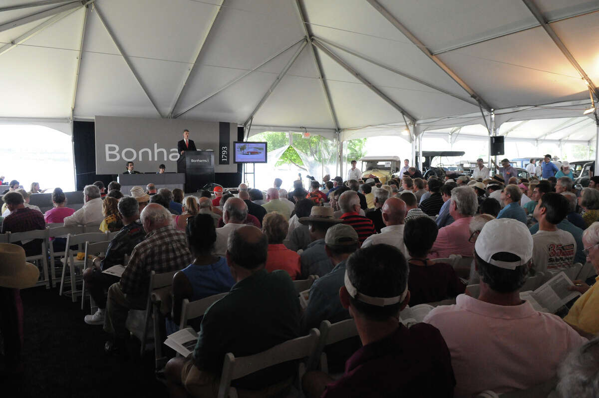 Auto auction, show hits with car crowd