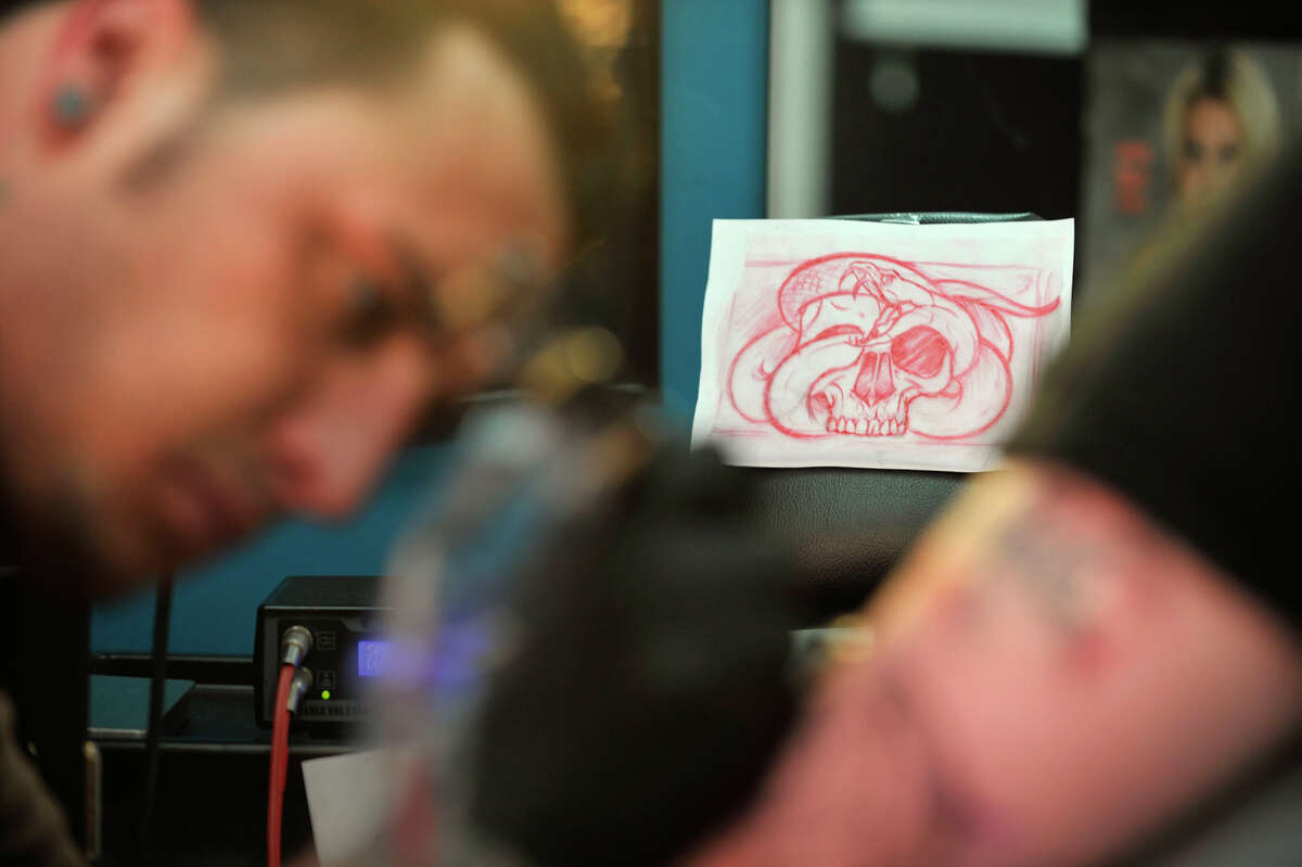 State considers licensing tattoo artists