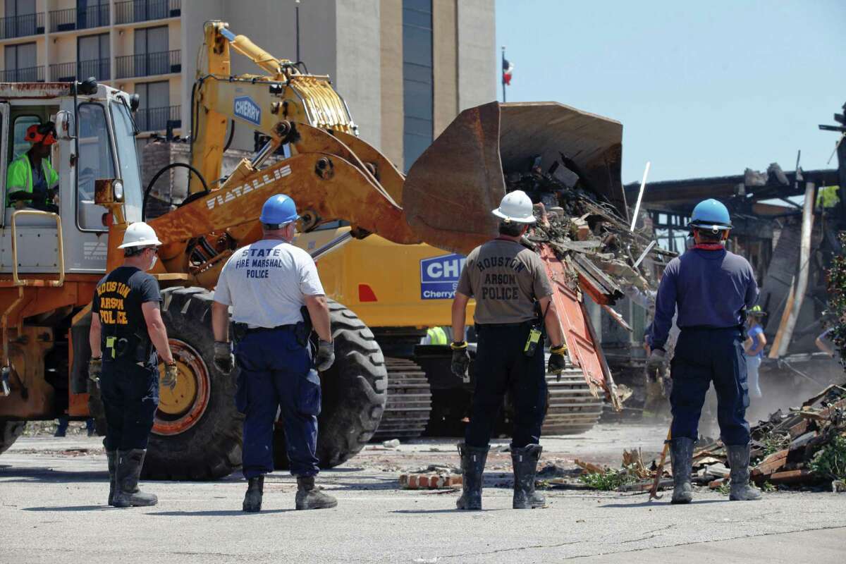 Houston firefighter critical as arson unit probes 'crime scene'