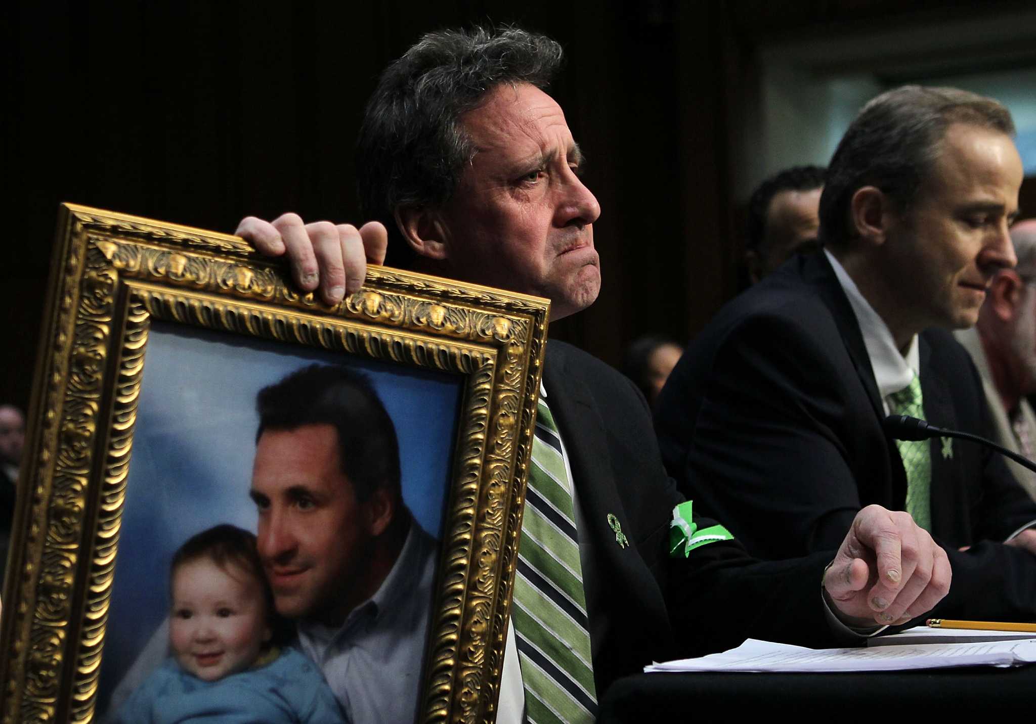 Sandy Hook families 'marching to different drummers'