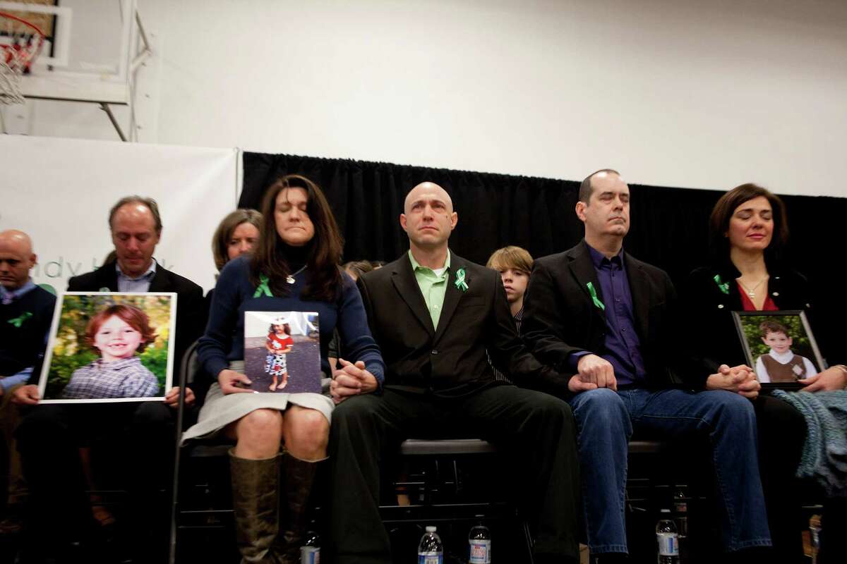 Sandy Hook families 'marching to different drummers'