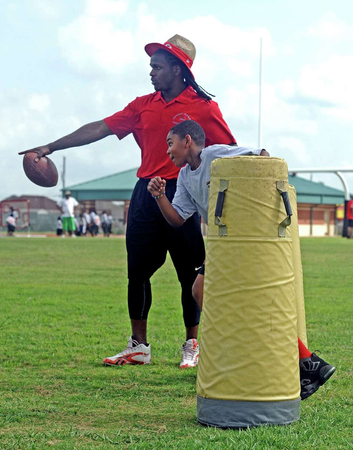 Jamaal Charles conducts free football camp