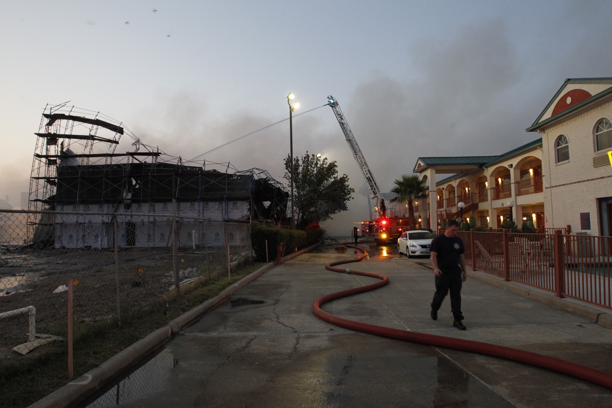 Unfinished Harris County motel collapses in massive fire