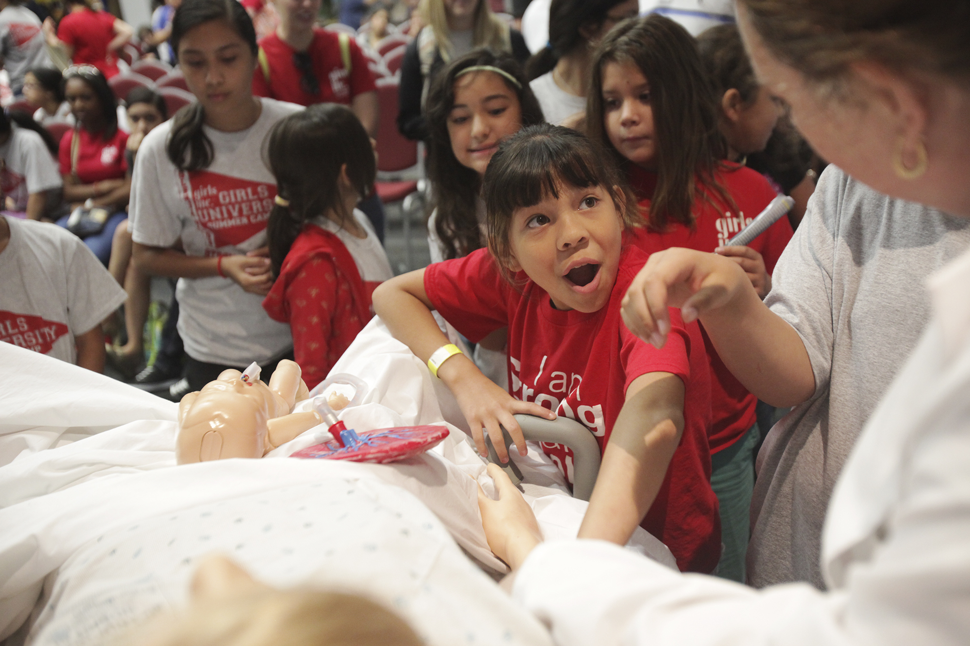 Girls watch childbirth simulation at St. Philips College