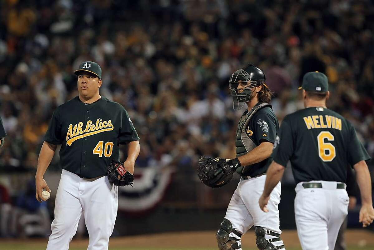 Cubs stop Colon's streak, A's