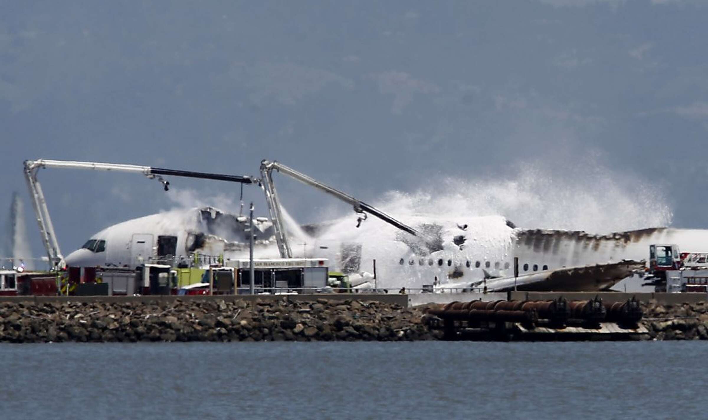 SF jetliner crash kills 2, seriously injures 49