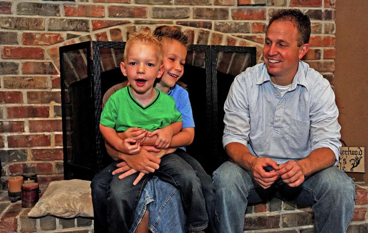 Beaumont cop, war veteran adopts kids with wife