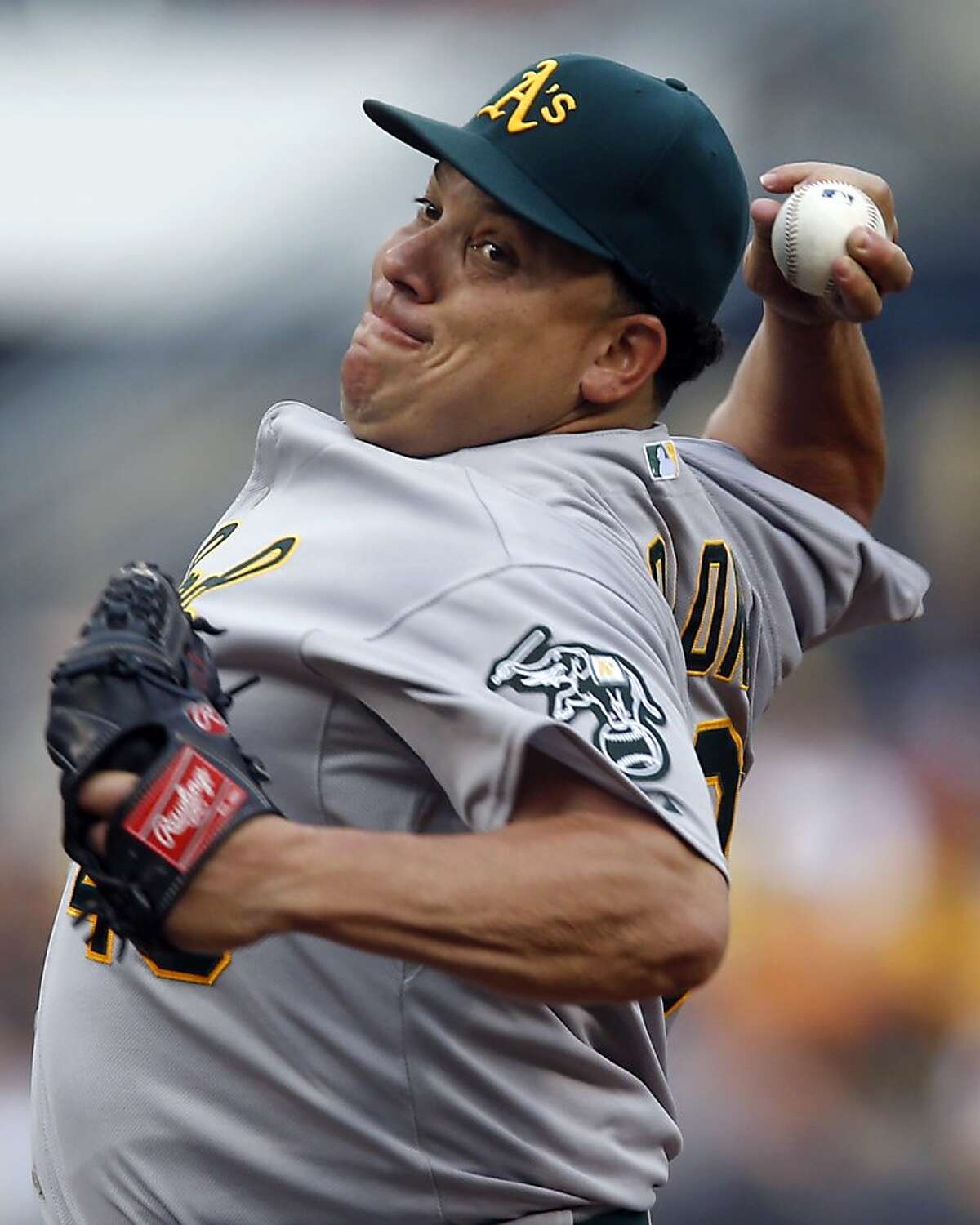 Defense, pitching carry A's past Pirates, 2-1