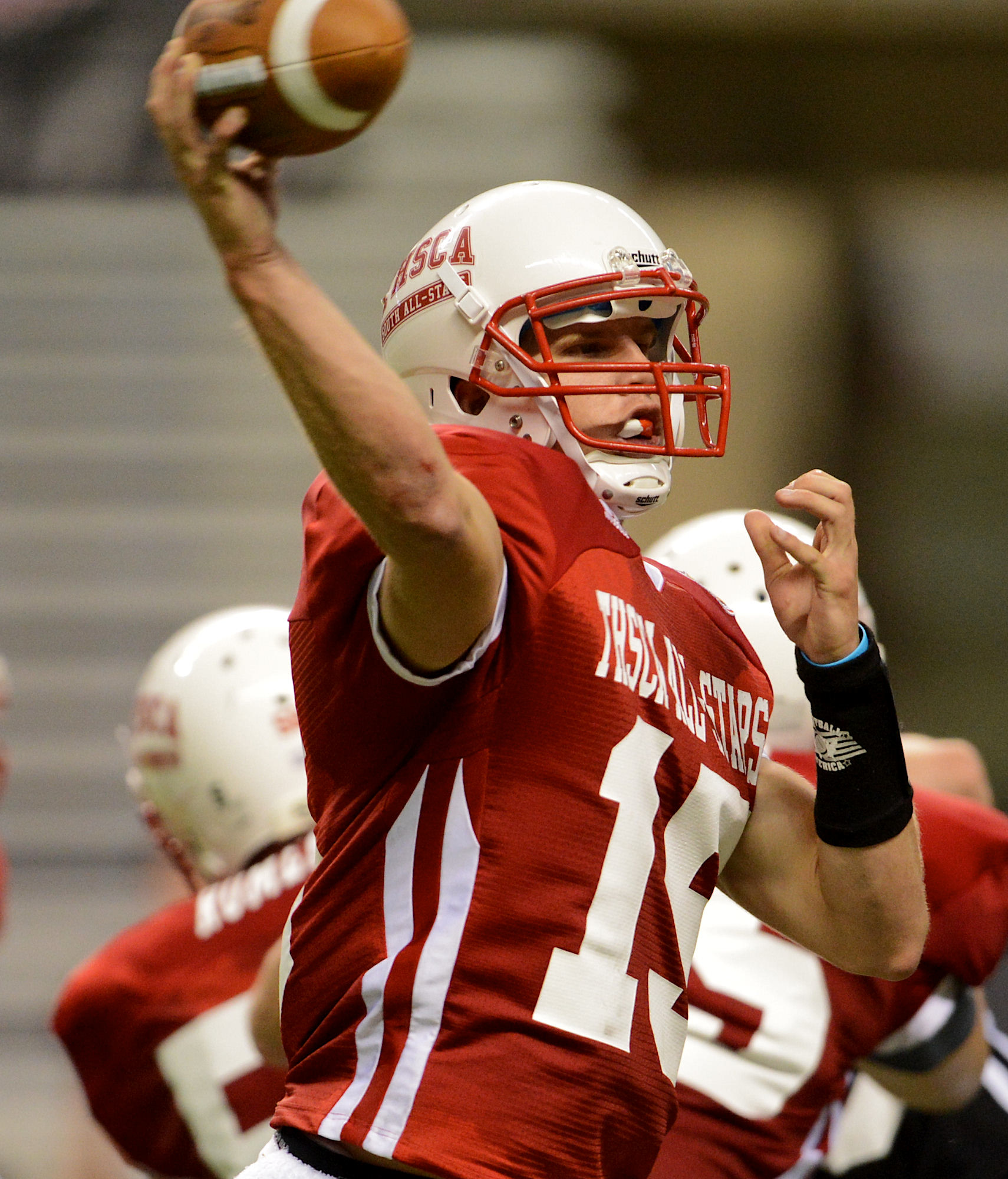 Former Warren QB switches schools