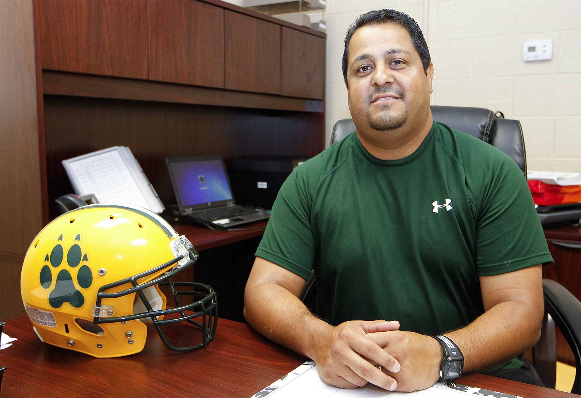 New Huskies football coach looks forward to playing his past