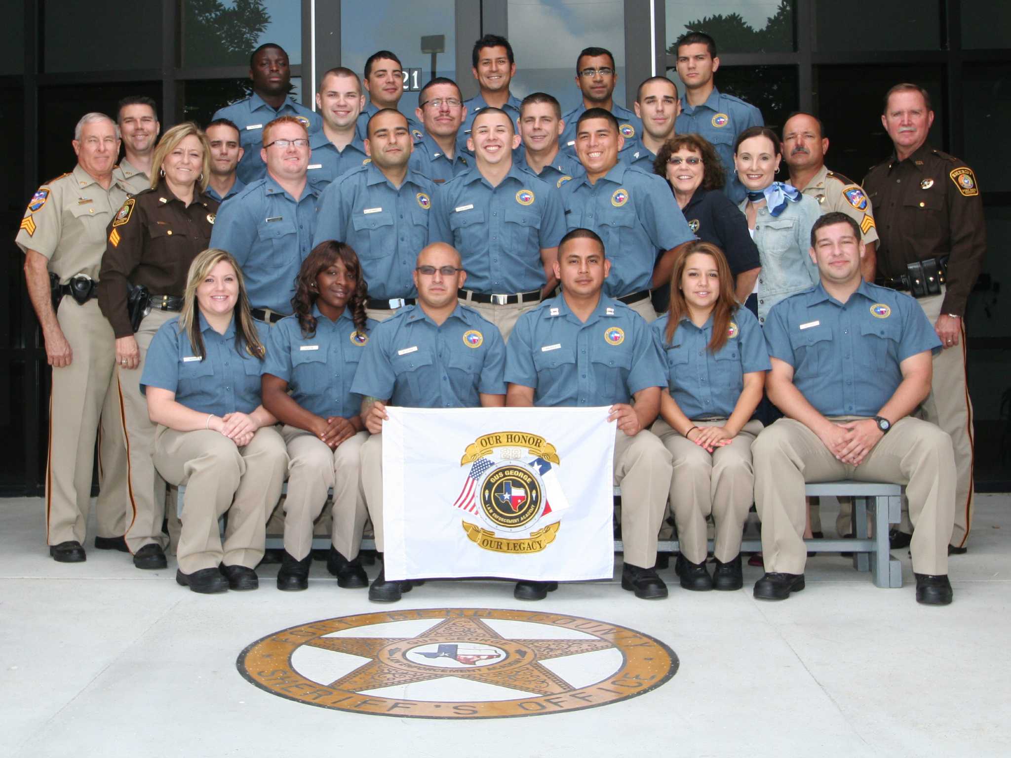 20 Gus George Law Enforcement Academy graduates pass state exam on ...