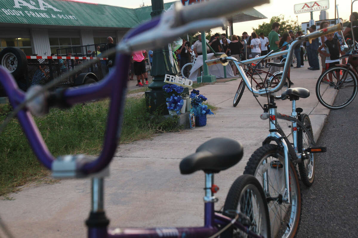 Vigil honors man killed while bicycling