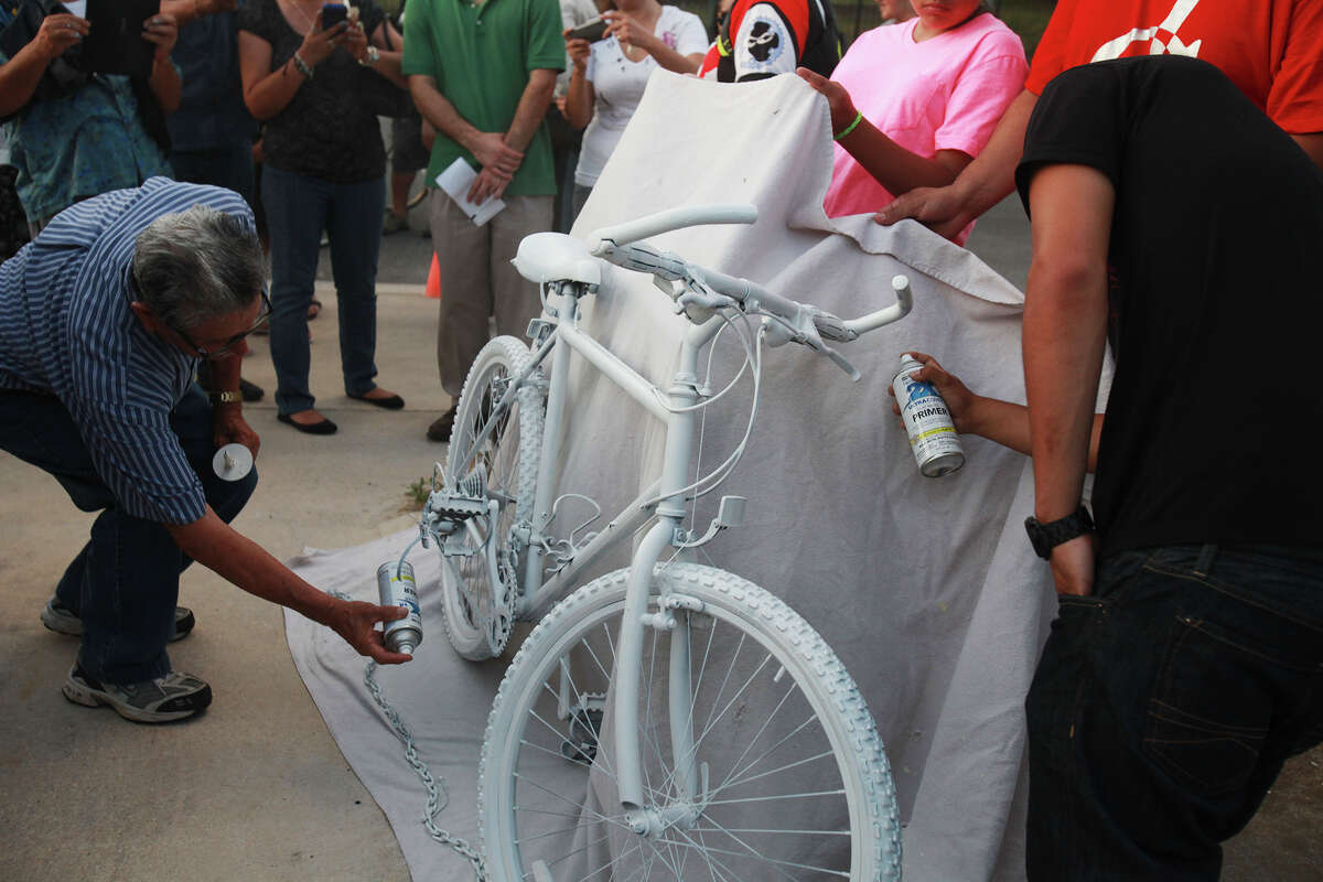 Vigil honors man killed while bicycling