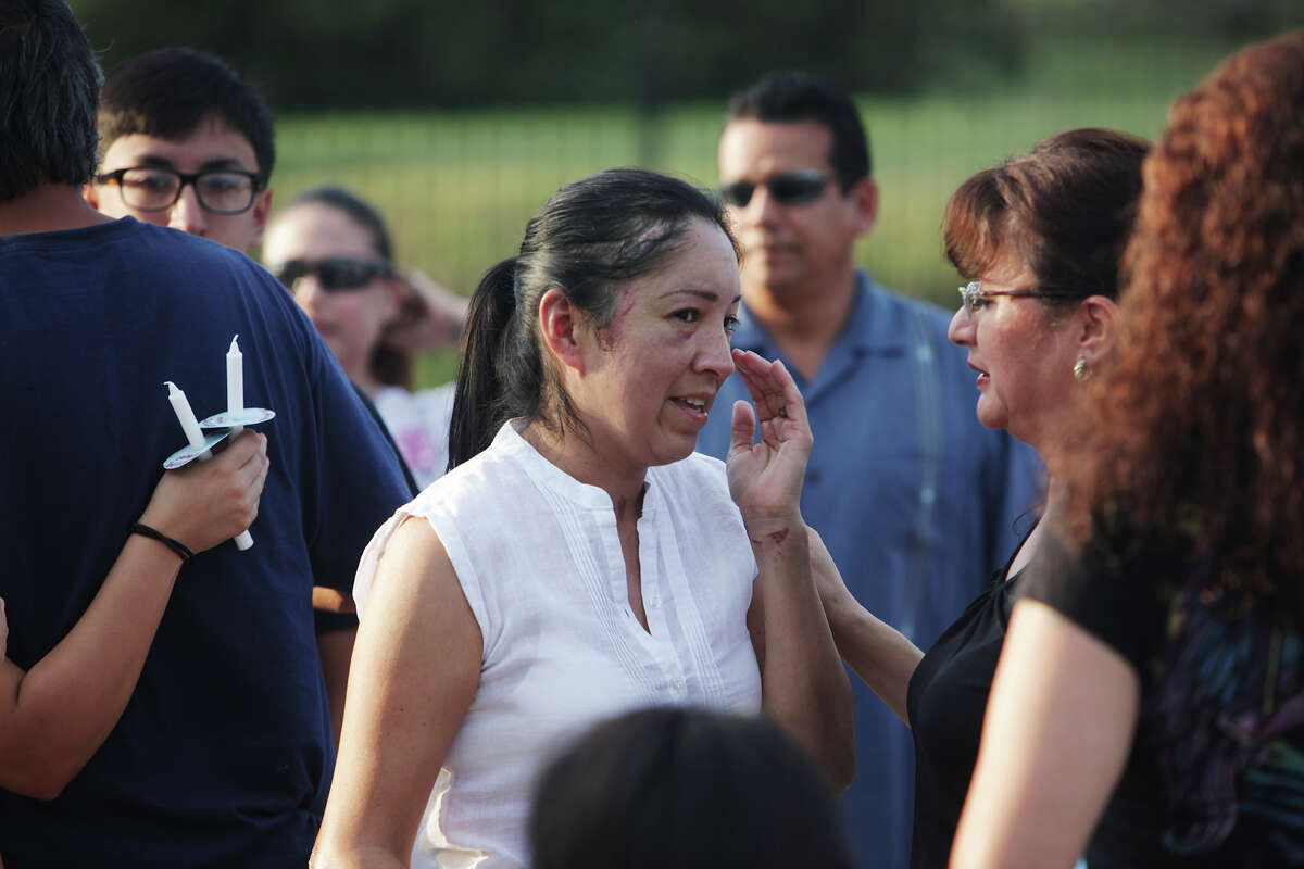 Vigil honors man killed while bicycling